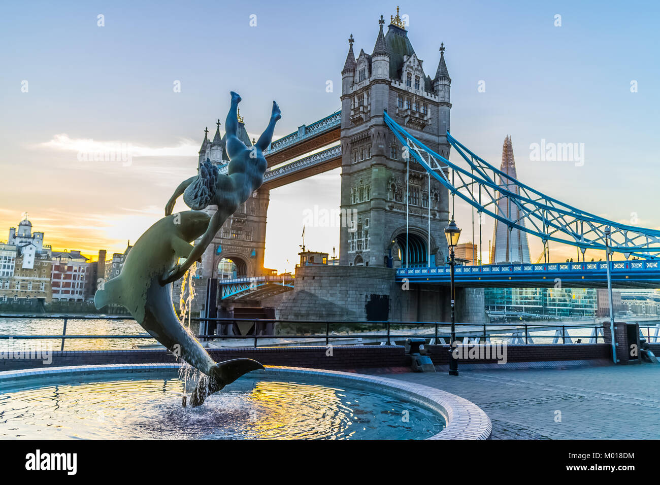 Girl with dolphin with Tower Bridge, River Thames, London Stock Photo ...