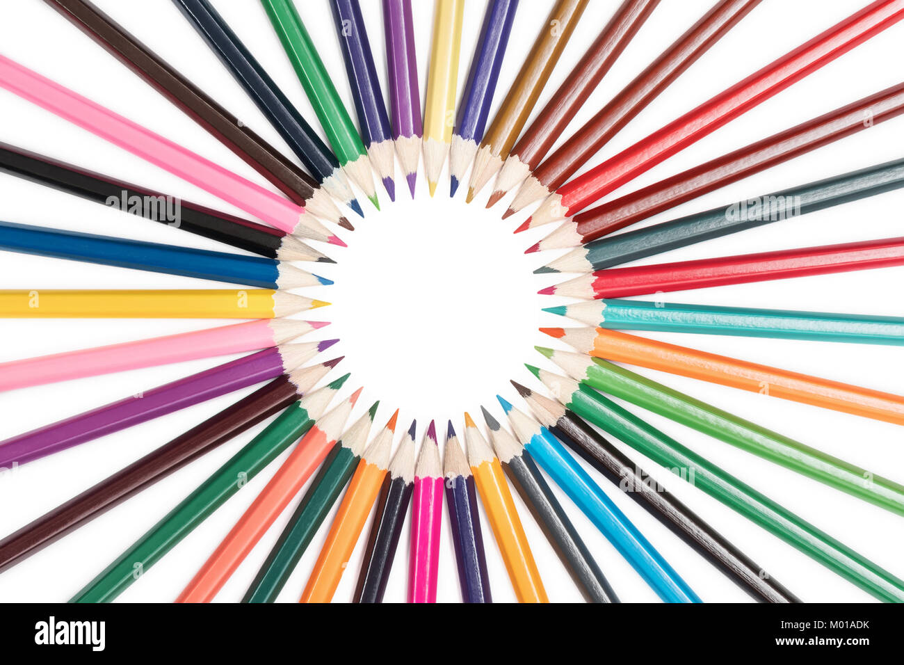 Set of colored pencils lined up in a circle with empty space inside ...