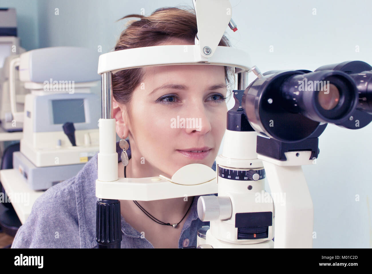 Checking eyesight in a clinic of the future Stock Photo - Alamy