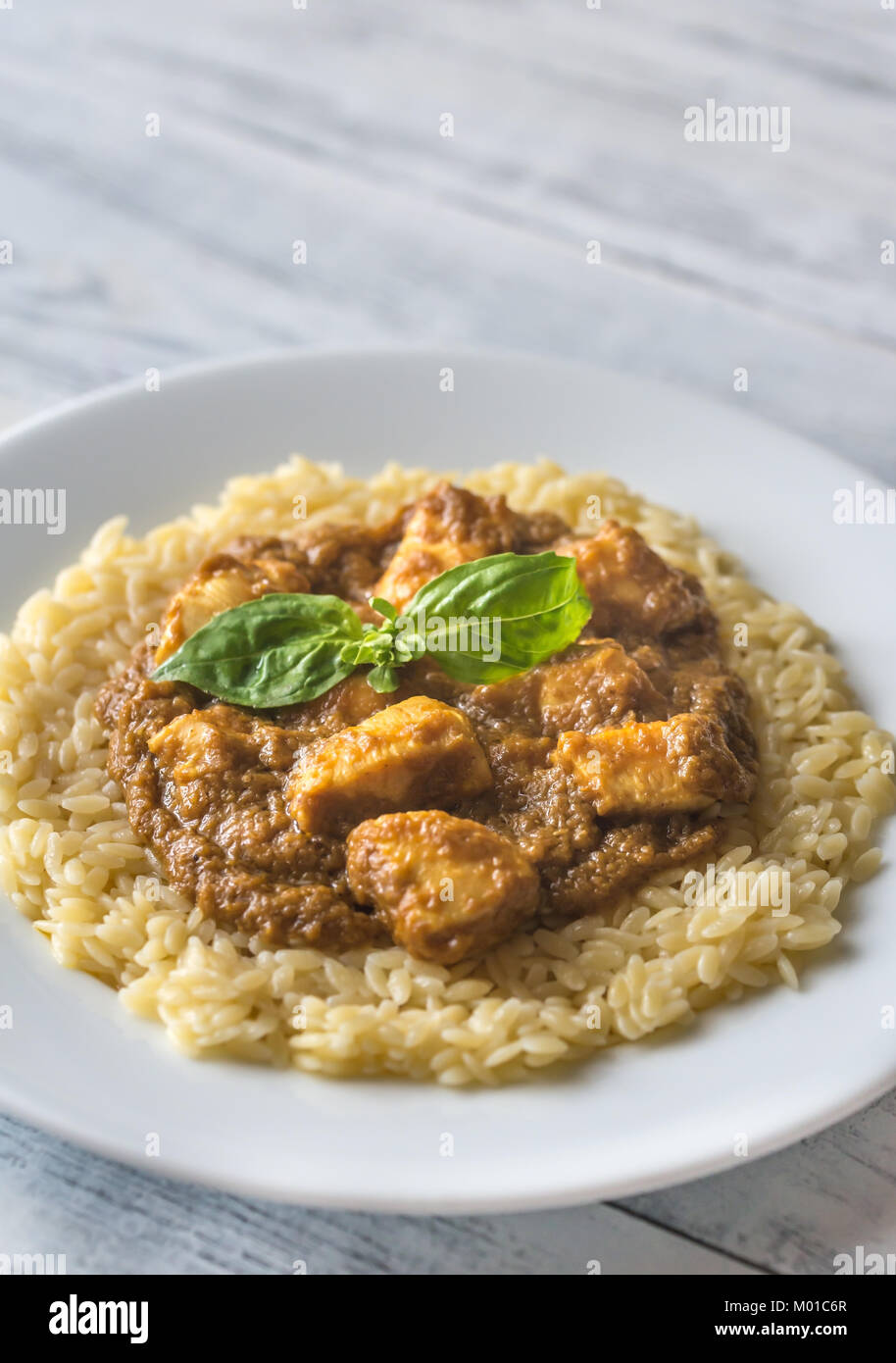 Pasta with korma sauce Stock Photo - Alamy