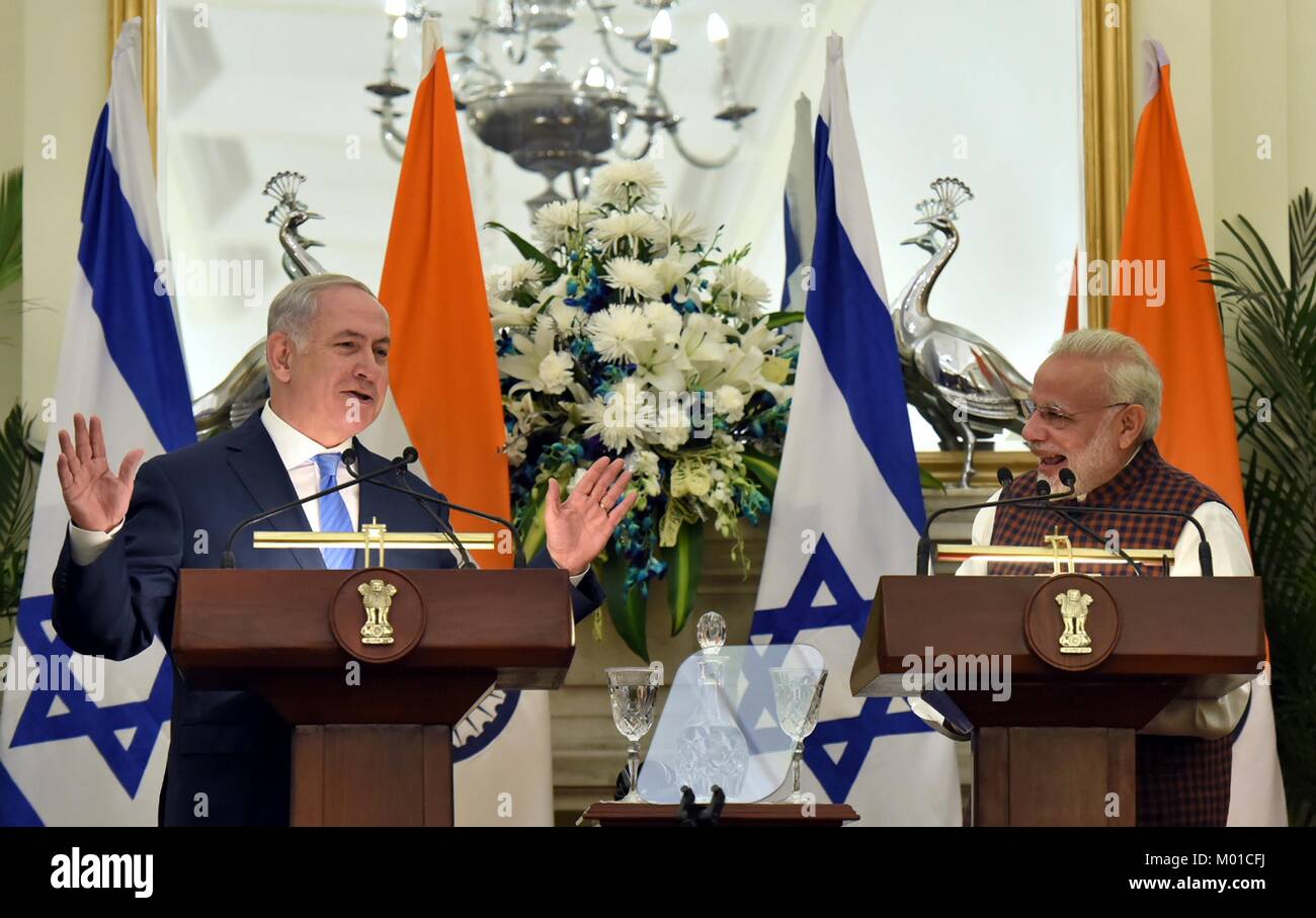 Indian Prime Minister Narendra Modi listens to Israeli Prime Minister ...