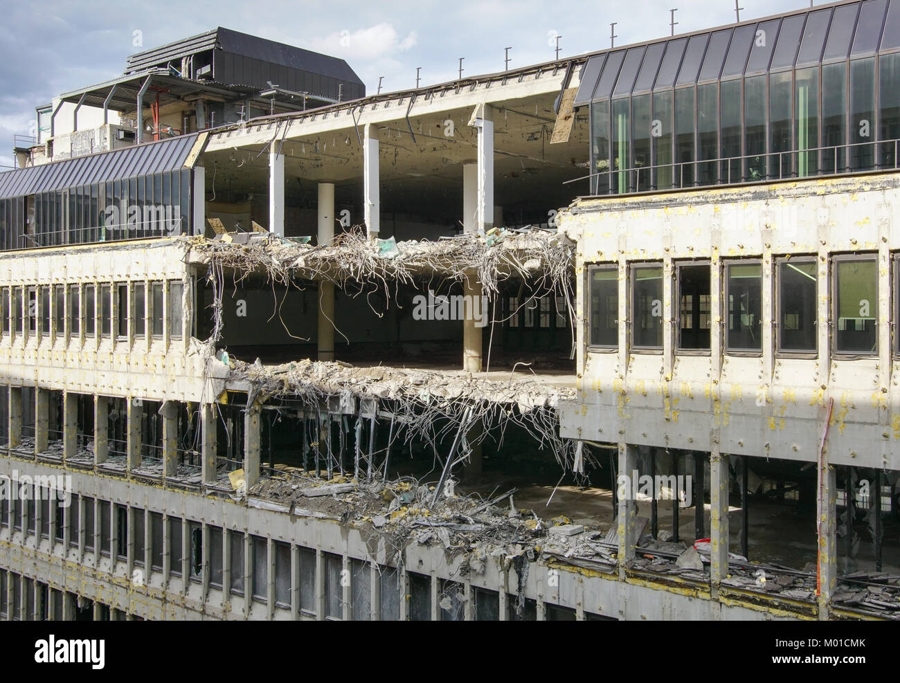 Topic destruction, teardown of an office building Stock Photo - Alamy