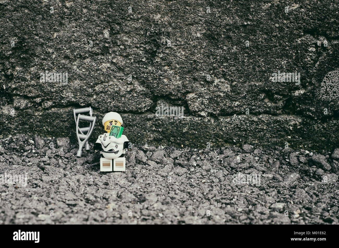 lego storm trooper injured asking for donation Stock Photo - Alamy