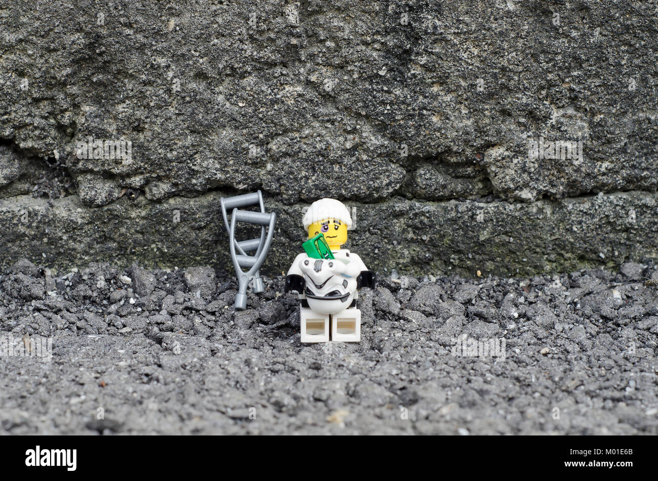 lego storm trooper injured asking for donation Stock Photo - Alamy