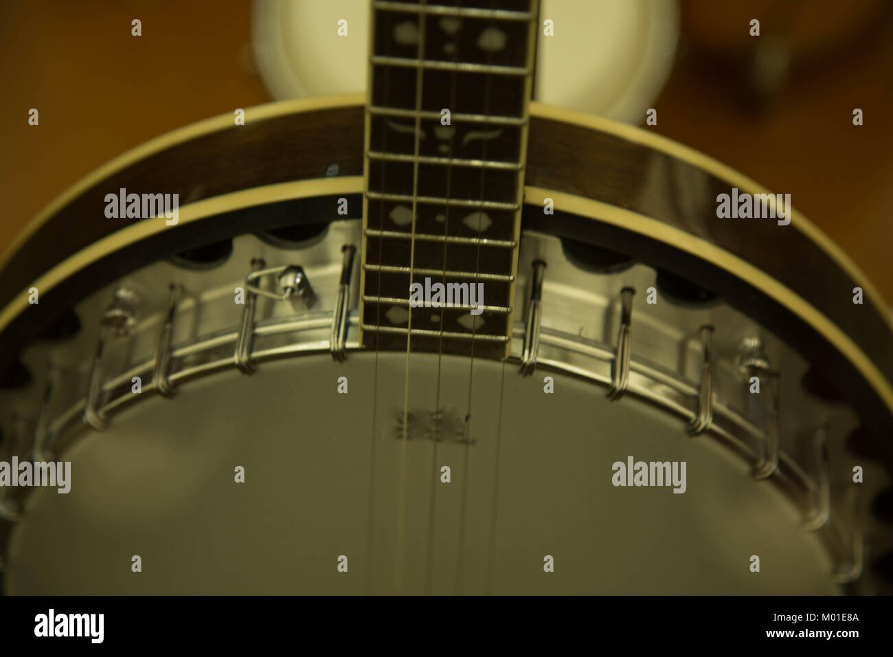 Banjo background closeup Stock Photo - Alamy