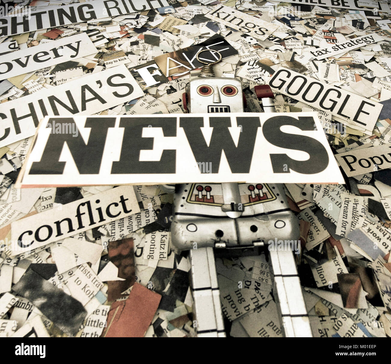 fake news concept wirh toy robots Stock Photo - Alamy