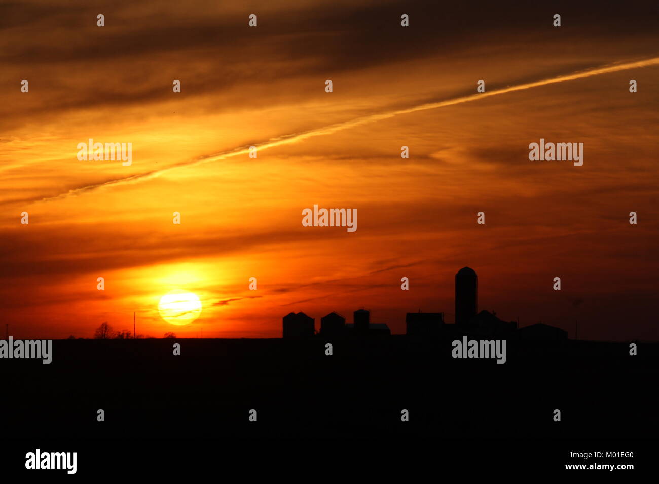 Iowa farm at sunset Stock Photo - Alamy