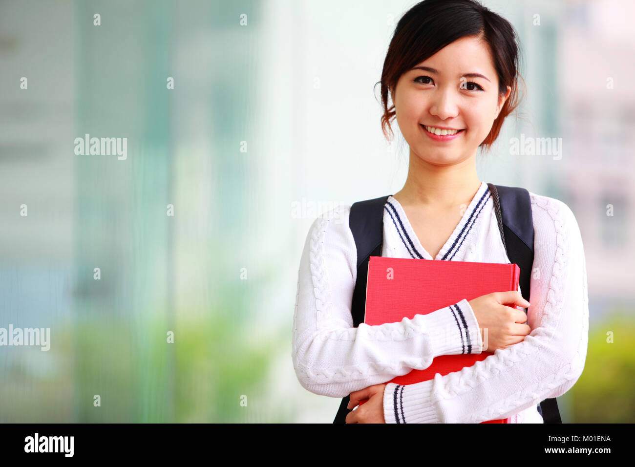 portrait of one young Chinese college girl smile at camera Stock Photo ...