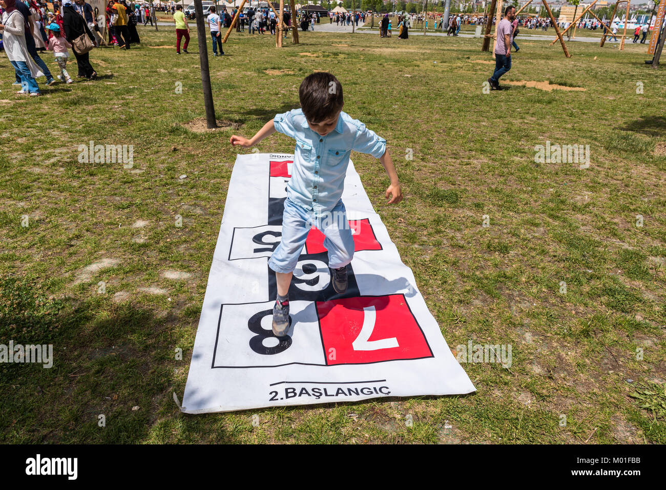 Unidentified children play hopscotch at a park .ISTANBUL, TURKEY,MAY 13 ...