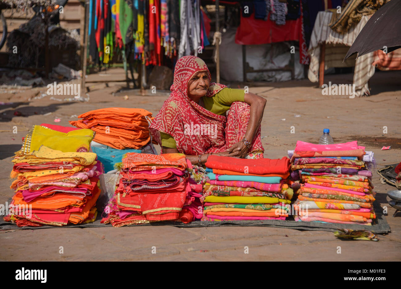Selling textiles in the blue town of Jodhpur, Rajasthan, India Stock ...