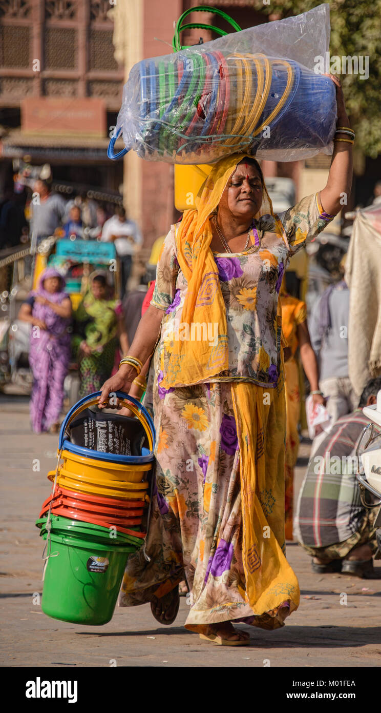 Woman Carrying Heavy Load In High Resolution Stock Photography and ...