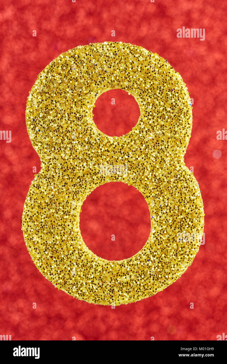 Number eight gold color over a red background. Anniversary. Vertical ...