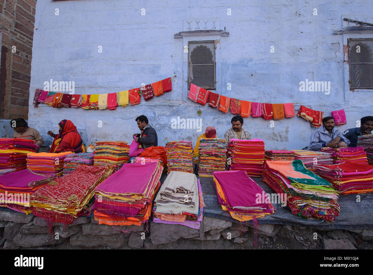 Selling textiles in the blue town of Jodhpur, Rajasthan, India Stock ...