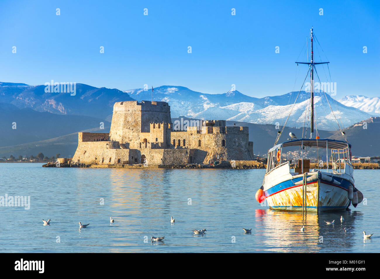 The Bourtzi water castle is a small island with a fortress at the coast ...