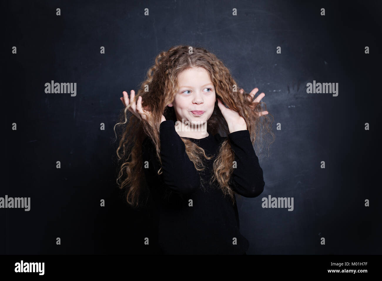 Redhead Child Girl. Cute Child with Long Red Hair Stock Photo - Alamy