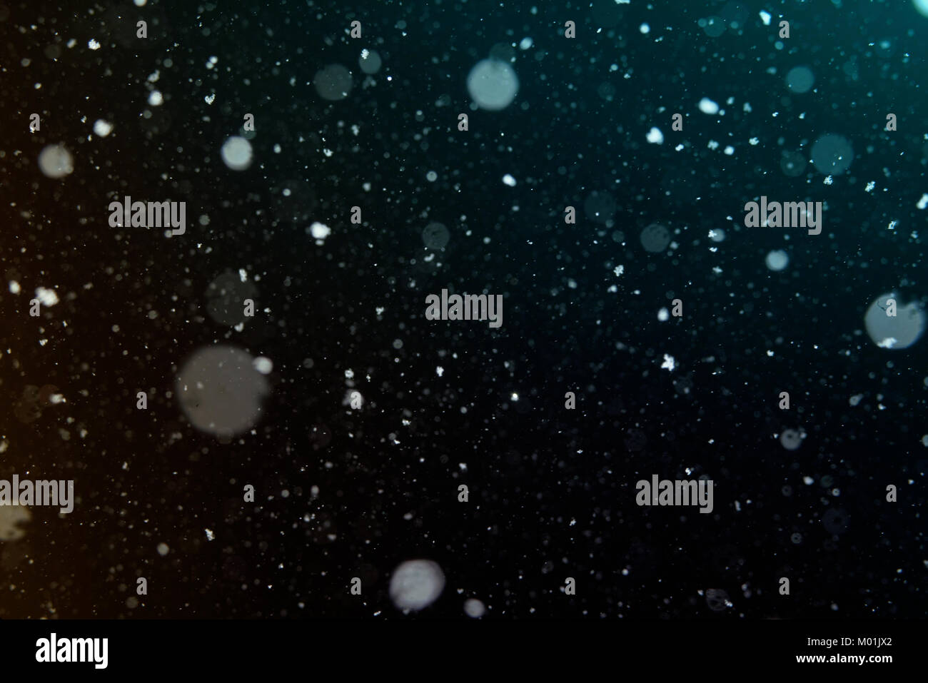 Dark background of snow dust at night Stock Photo - Alamy