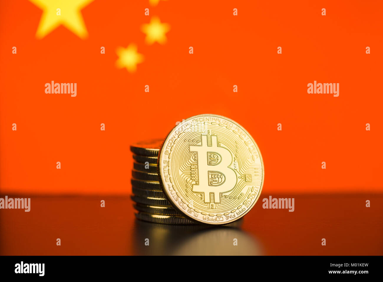 Golden bitcoins and chinese flag. Digital cryptocurrency Stock Photo ...