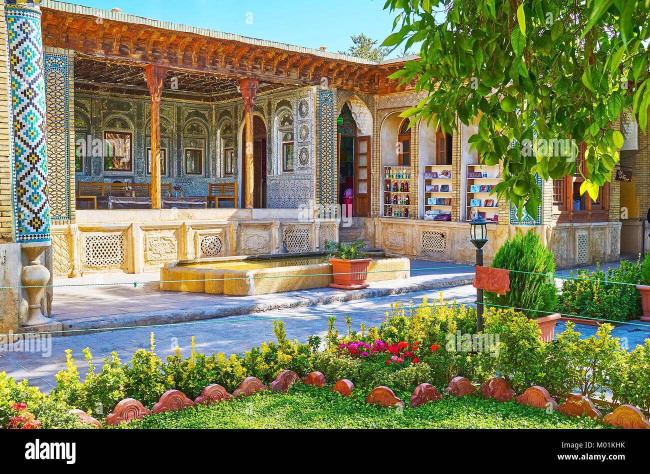 SHIRAZ, IRAN - OCTOBER 12, 2017: The view through the greenery of ...