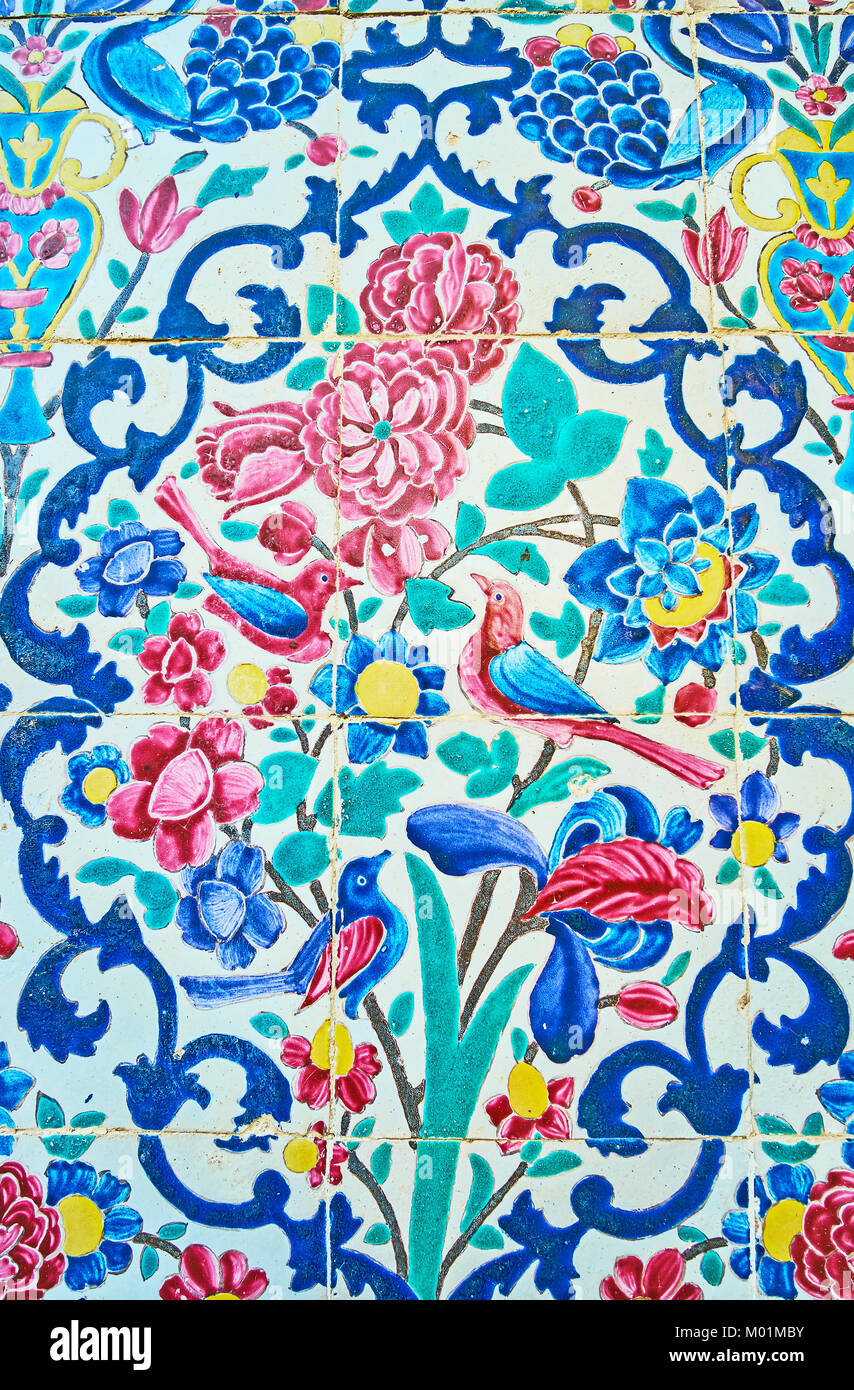 The glazed tiles are covered with colorful flowers and birds, one of ...