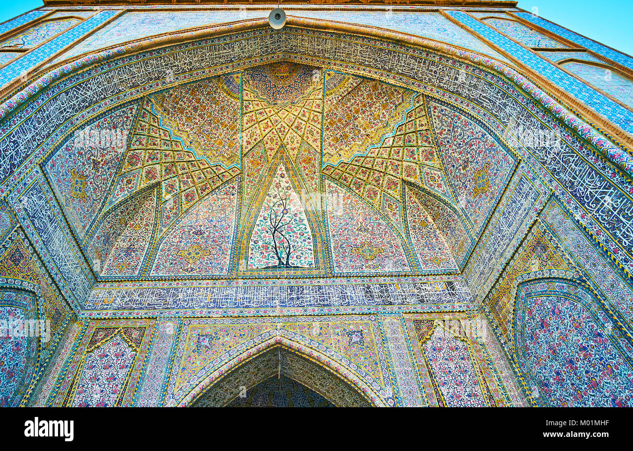 The elements of the entrance portal of Vakil Mosque with scenic islamic ...