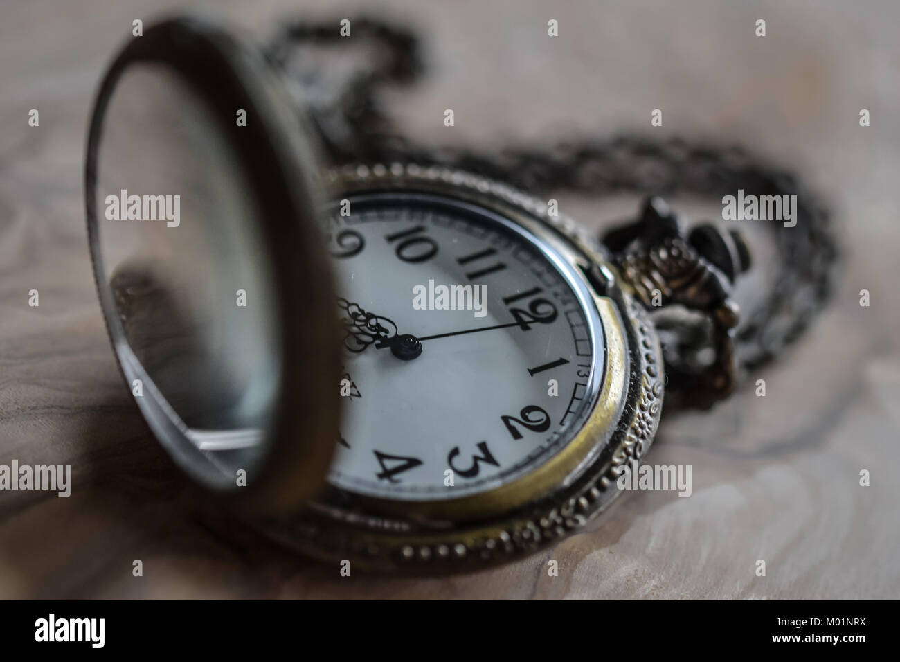 Vintage pocket watch background hi-res stock photography and images - Alamy