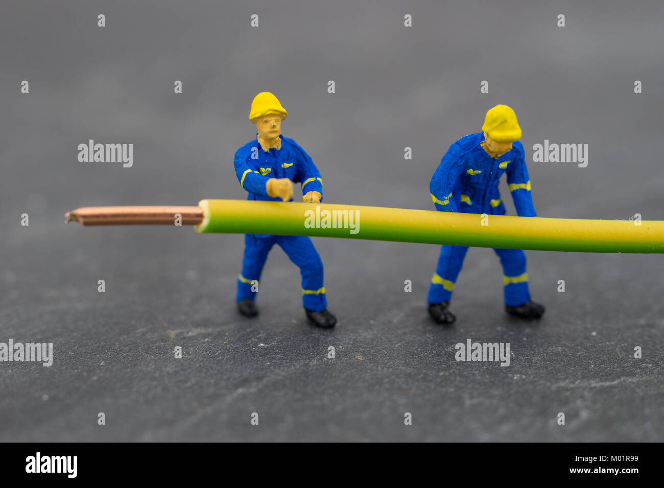 Miniature with powercable for connecting concept picture Stock Photo ...