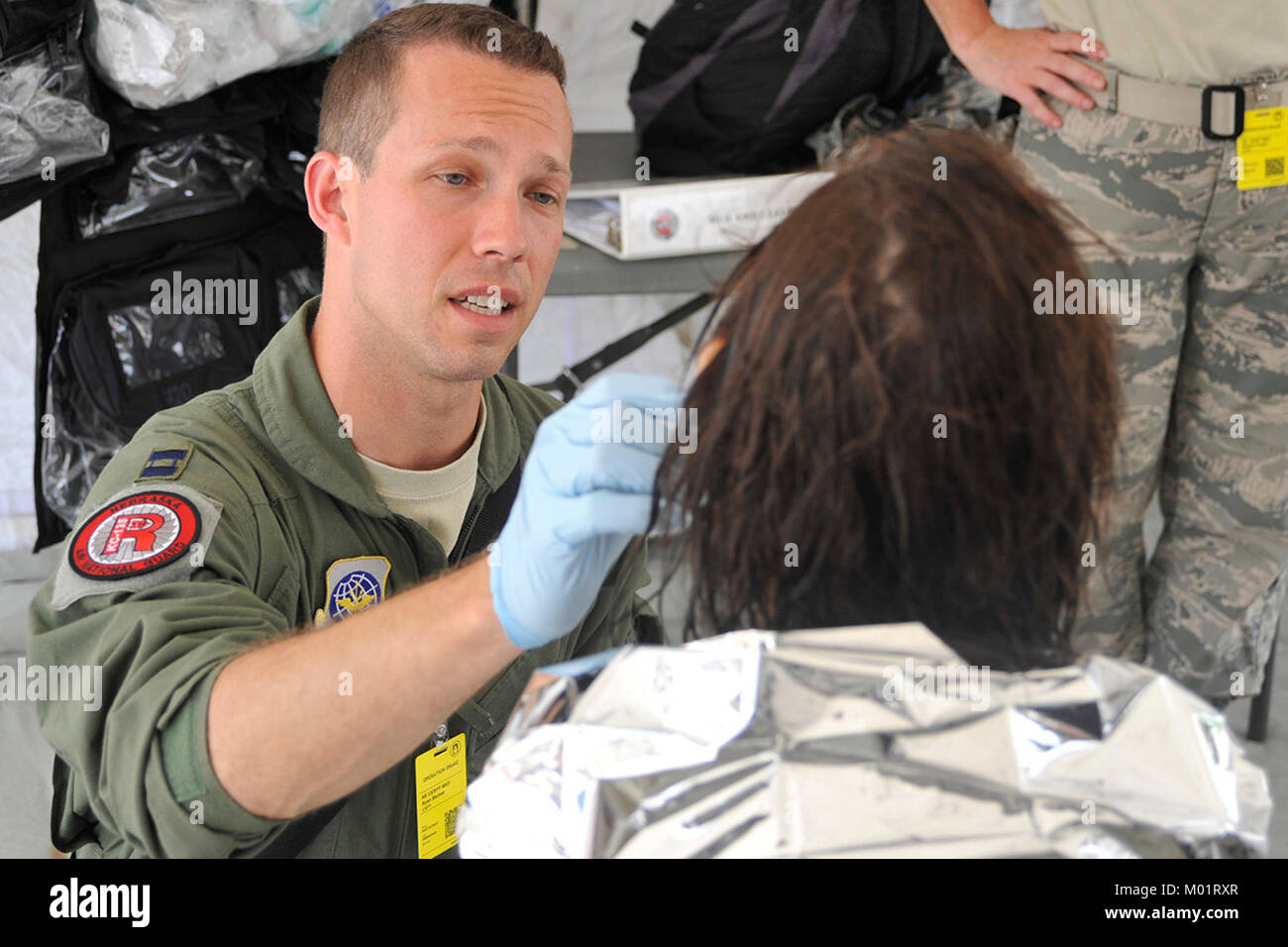 Capt. Ryan Decker, a Nebraska Air National Guard flight doctor with the ...