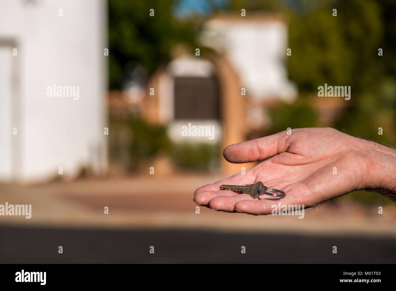 Key handover door house hi-res stock photography and images - Alamy