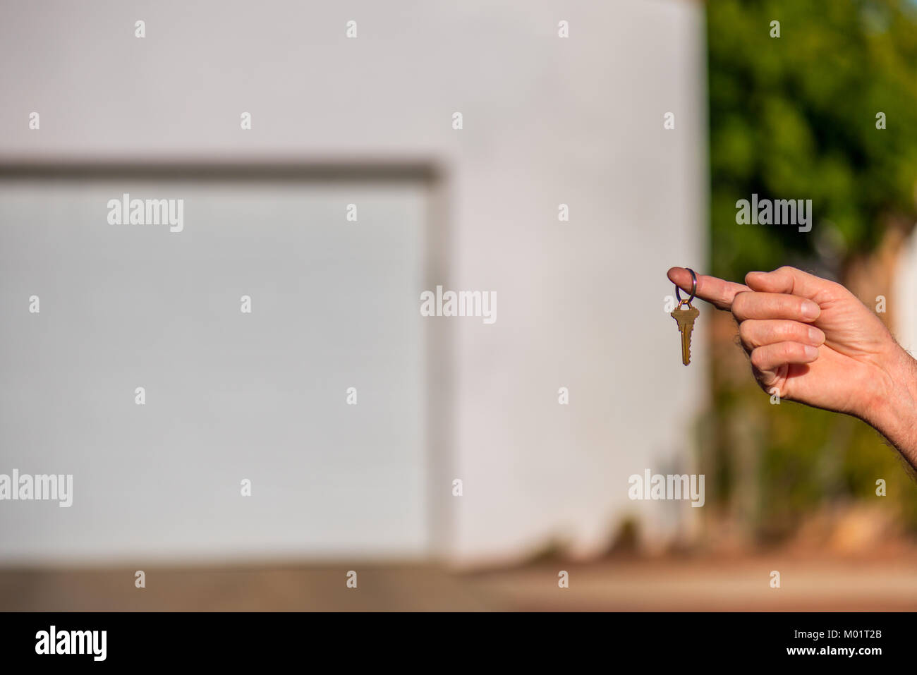 Handing over keys hi-res stock photography and images - Alamy