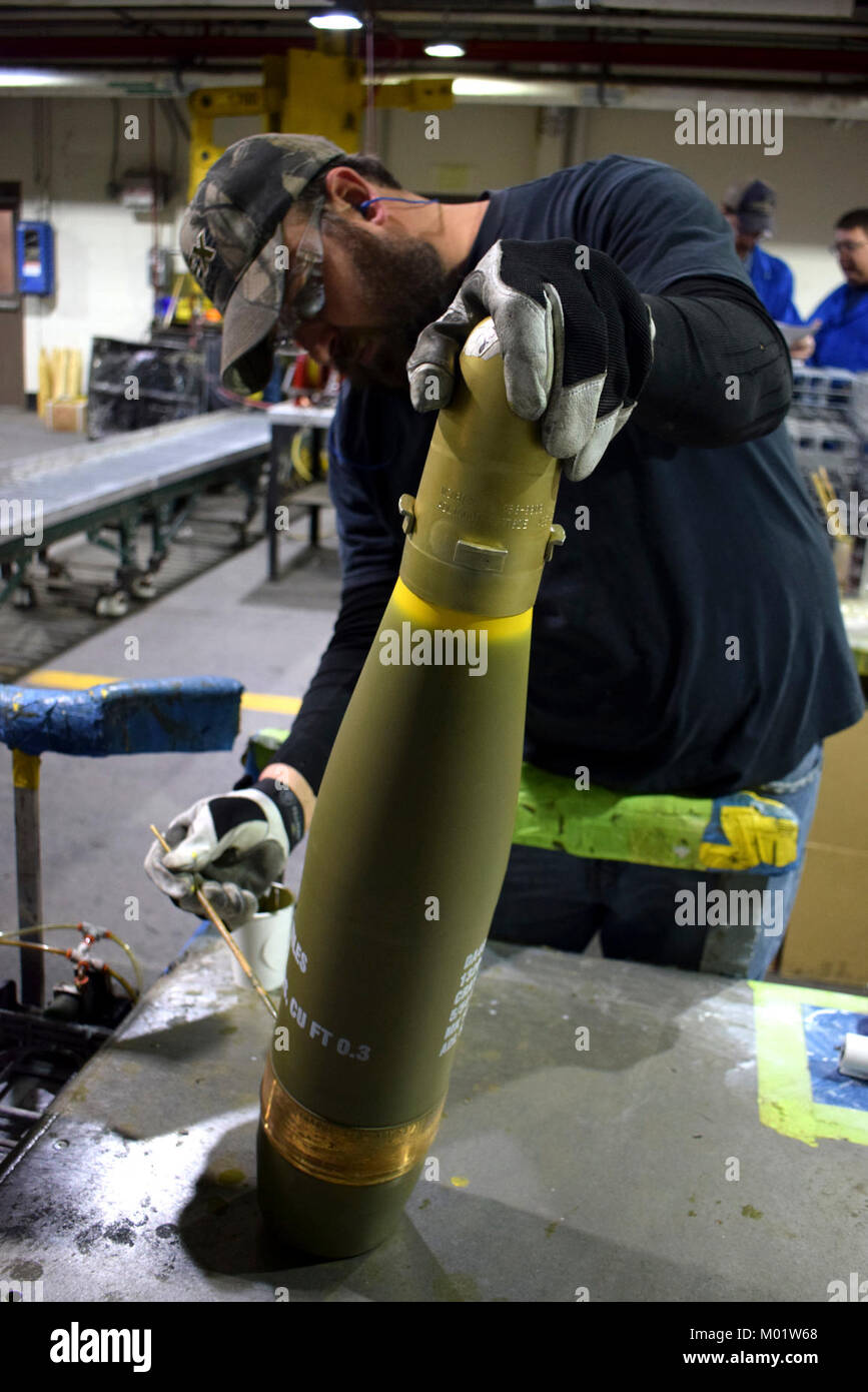 Crane Army employees manufacture rounds for the MK 45 five-inch gun ...