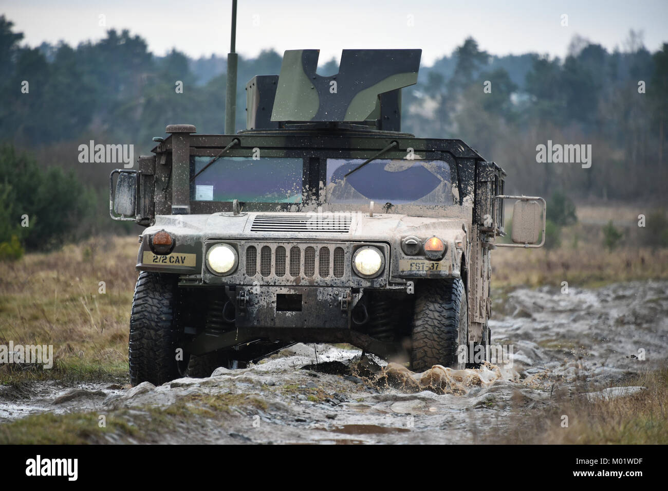 U.S. Soldiers with 2d Squadron, 2d Cavalry Regiment maneuver a High ...
