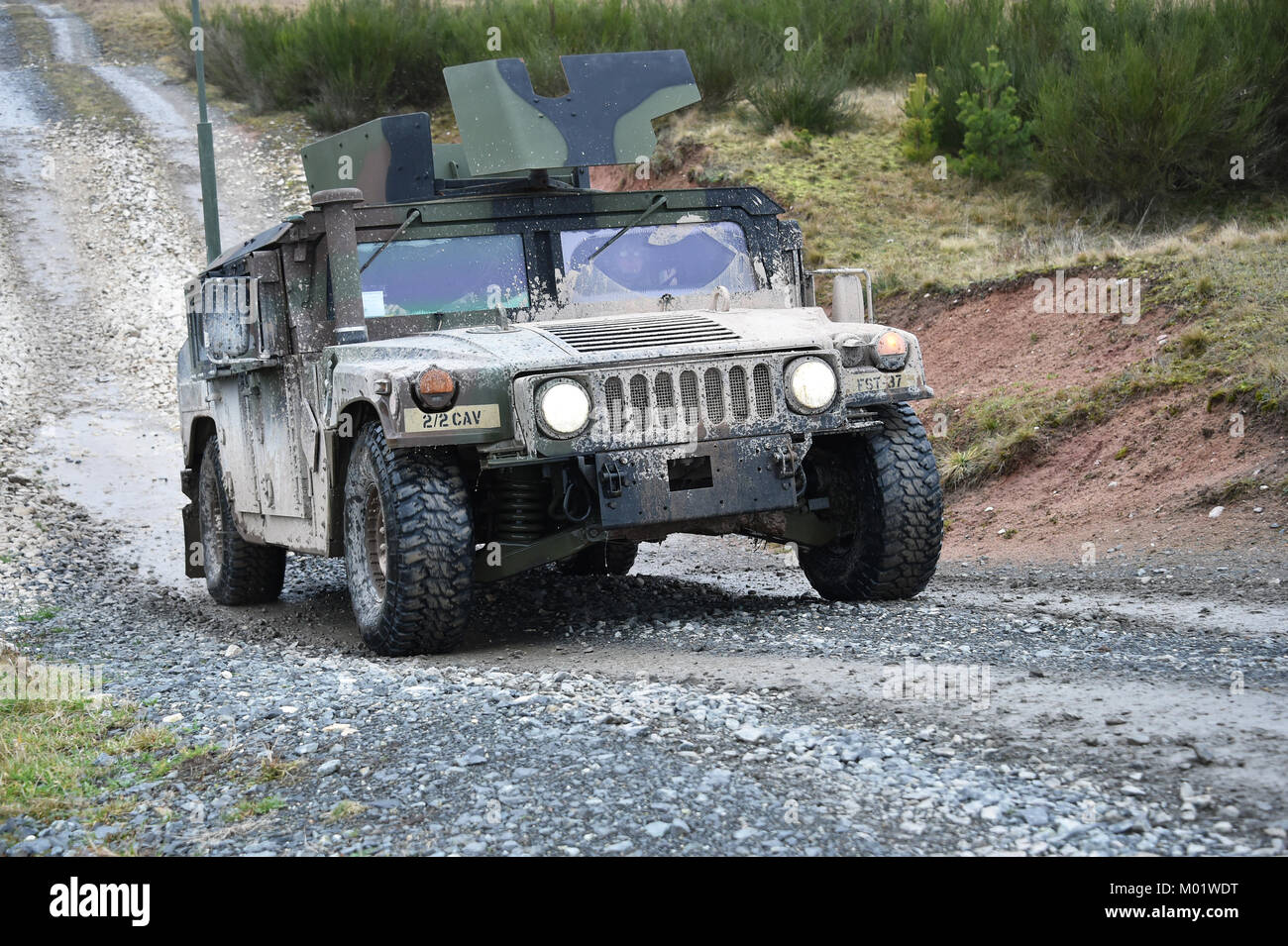 U.S. Soldiers with 2d Squadron, 2d Cavalry Regiment maneuver a High ...