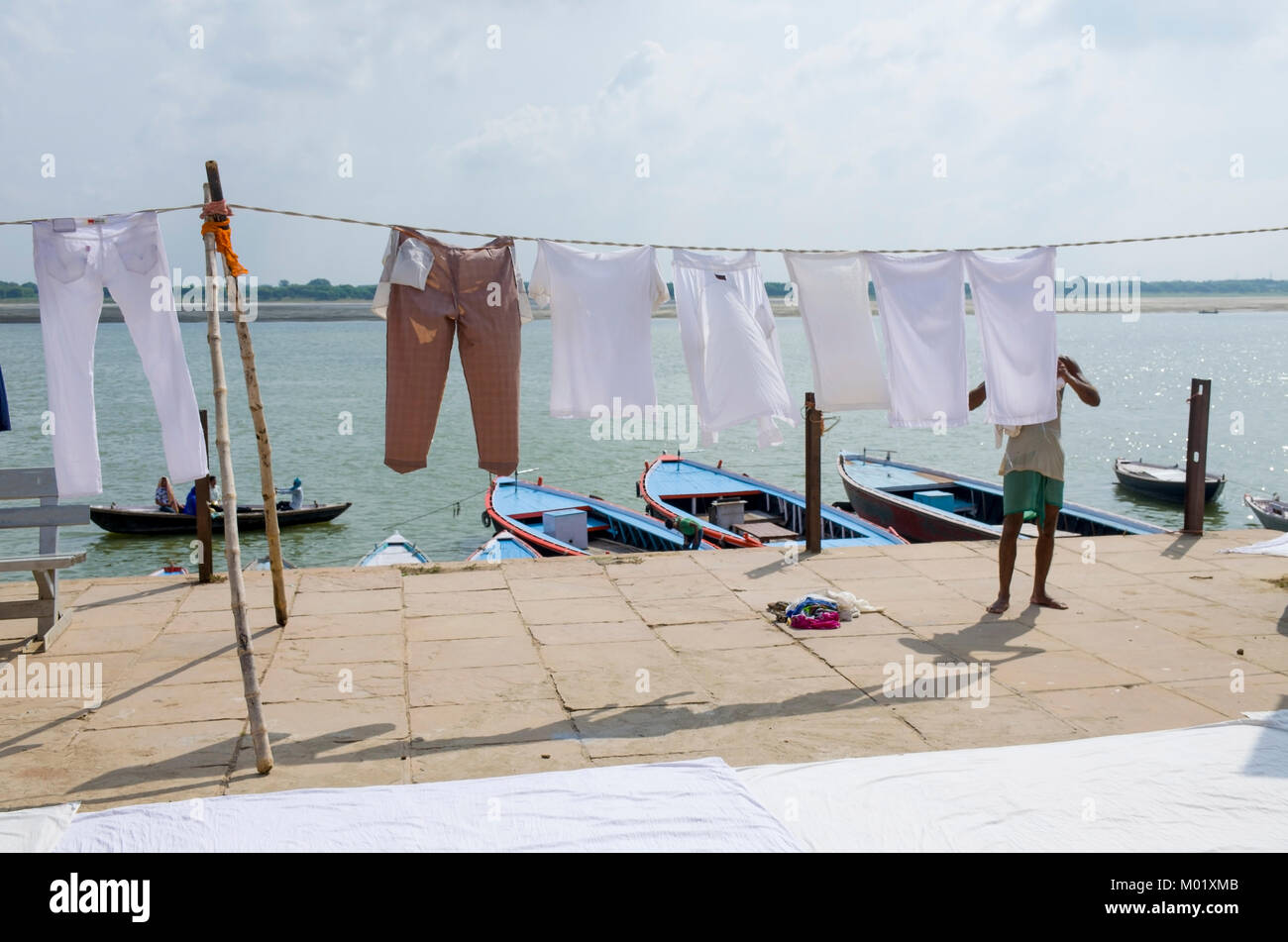 Washing on the river of Ganges in Varanasi India Stock Photo - Alamy