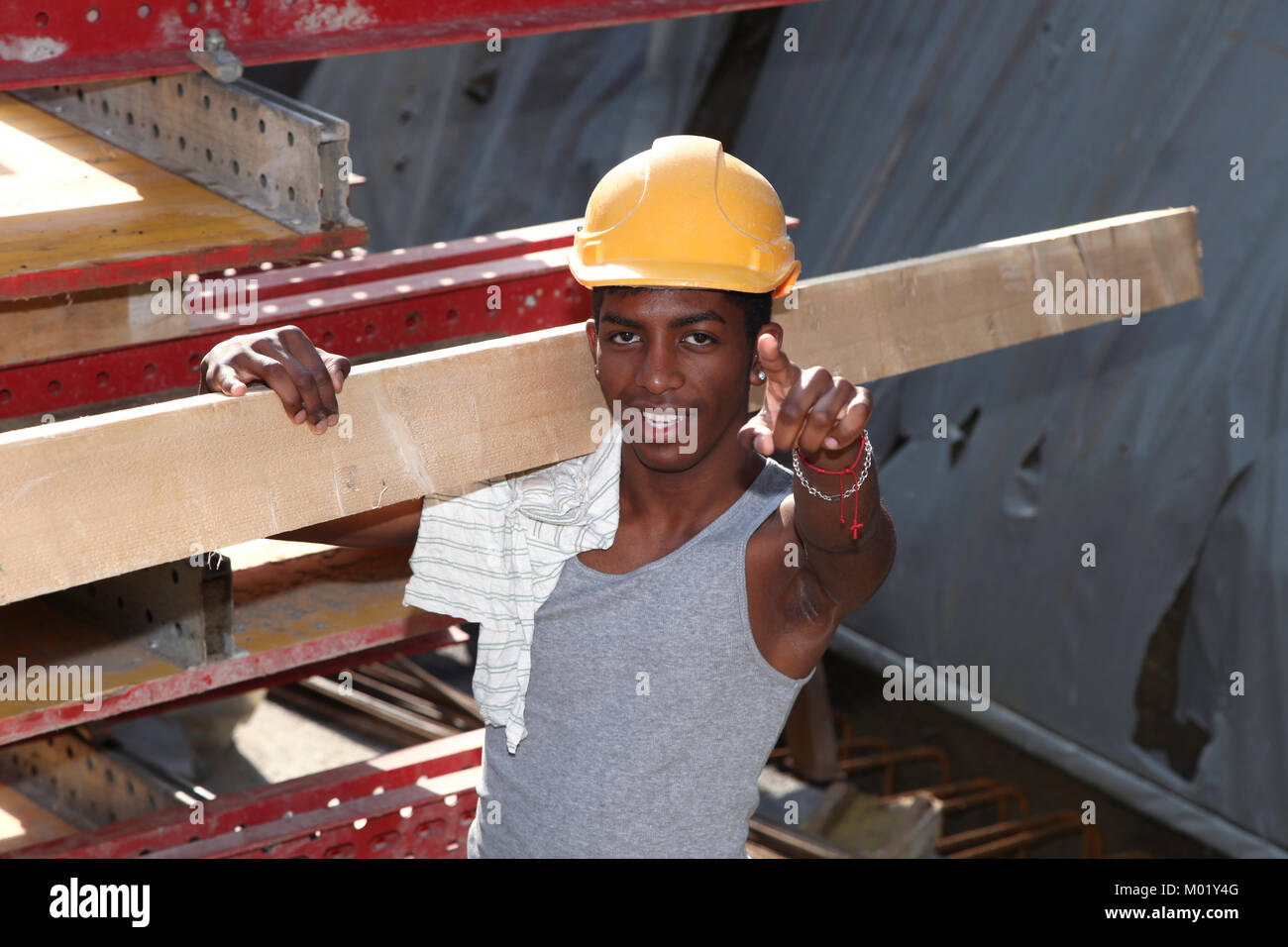 young black man working in construction site Stock Photo - Alamy