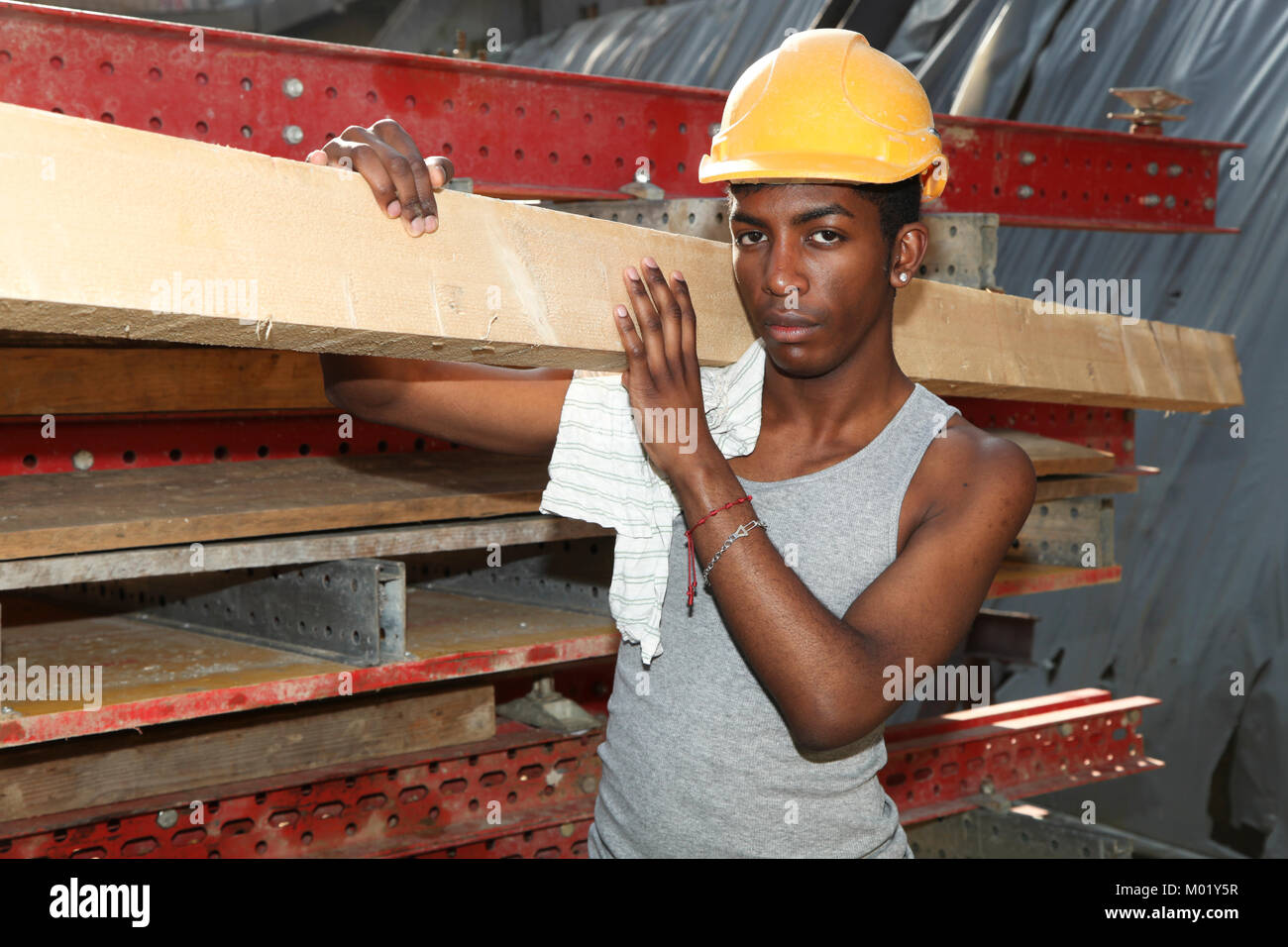 young black man working in construction site Stock Photo - Alamy