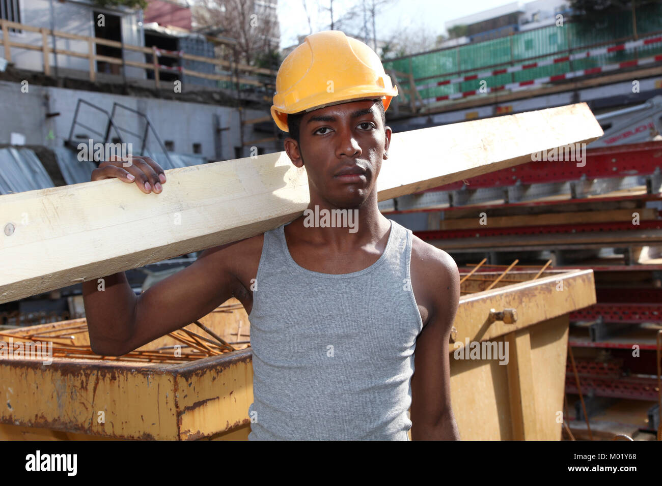 young black man working in construction site Stock Photo - Alamy