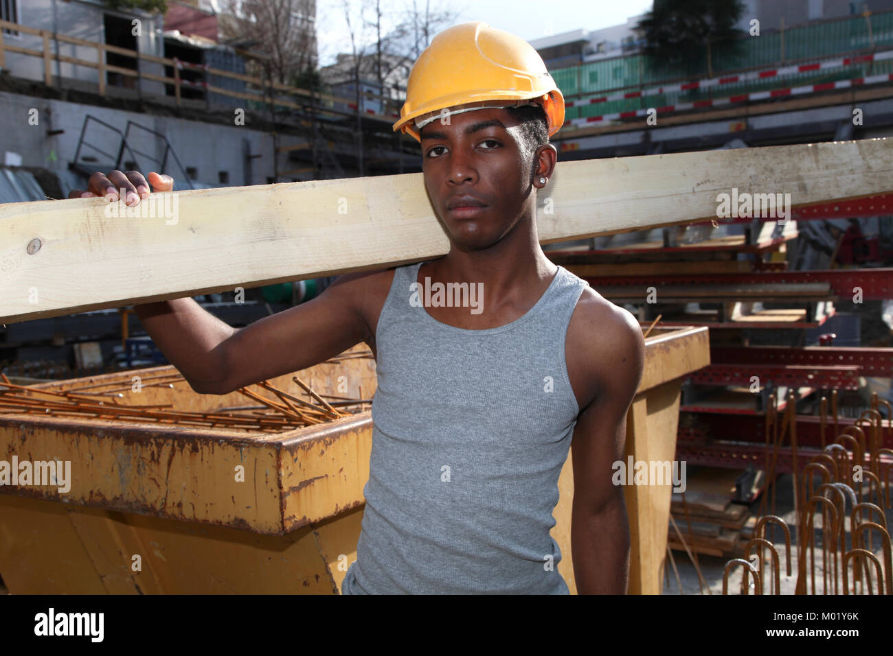 young black man working in construction site Stock Photo - Alamy