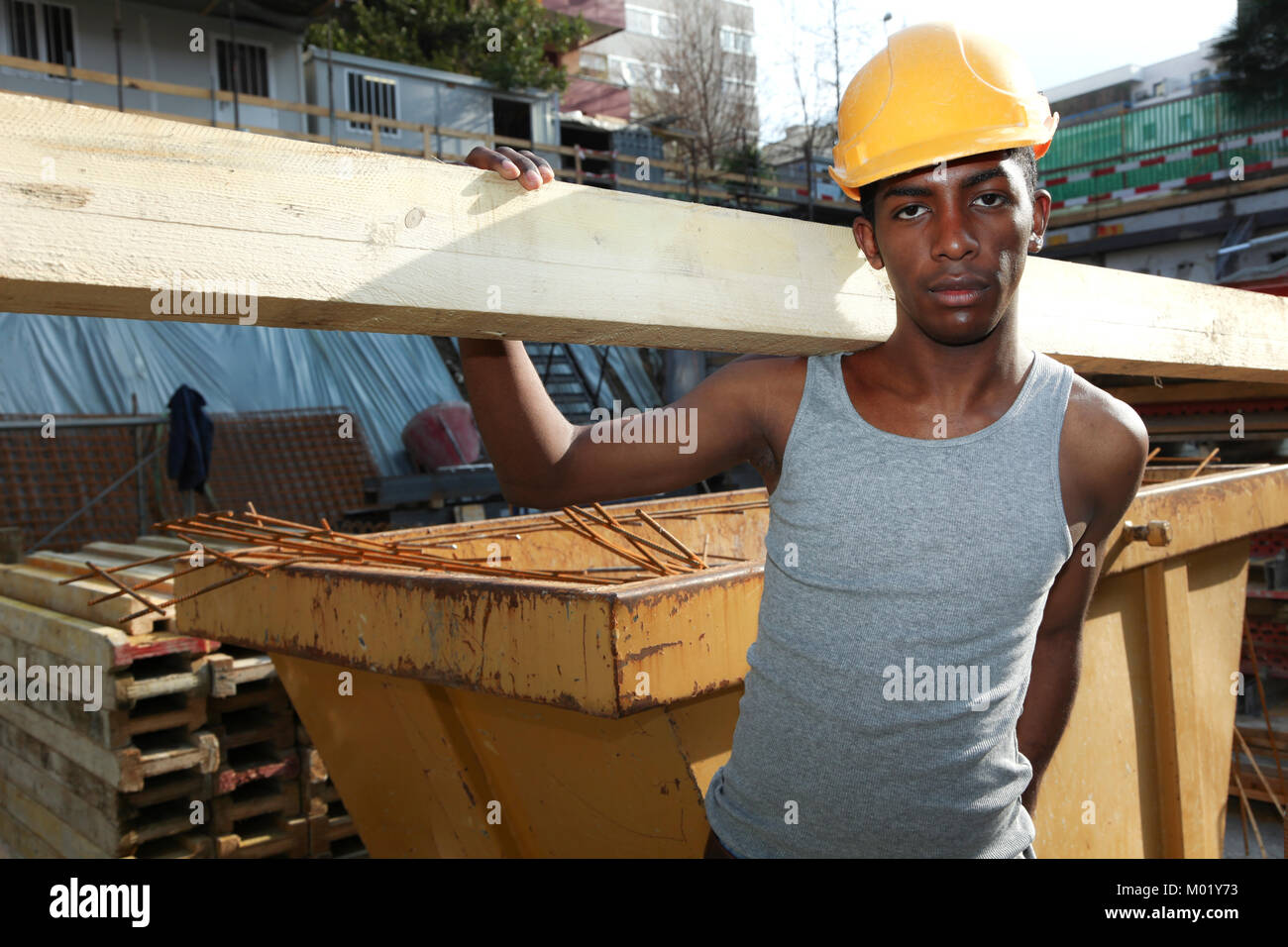 young black man working in construction site Stock Photo - Alamy