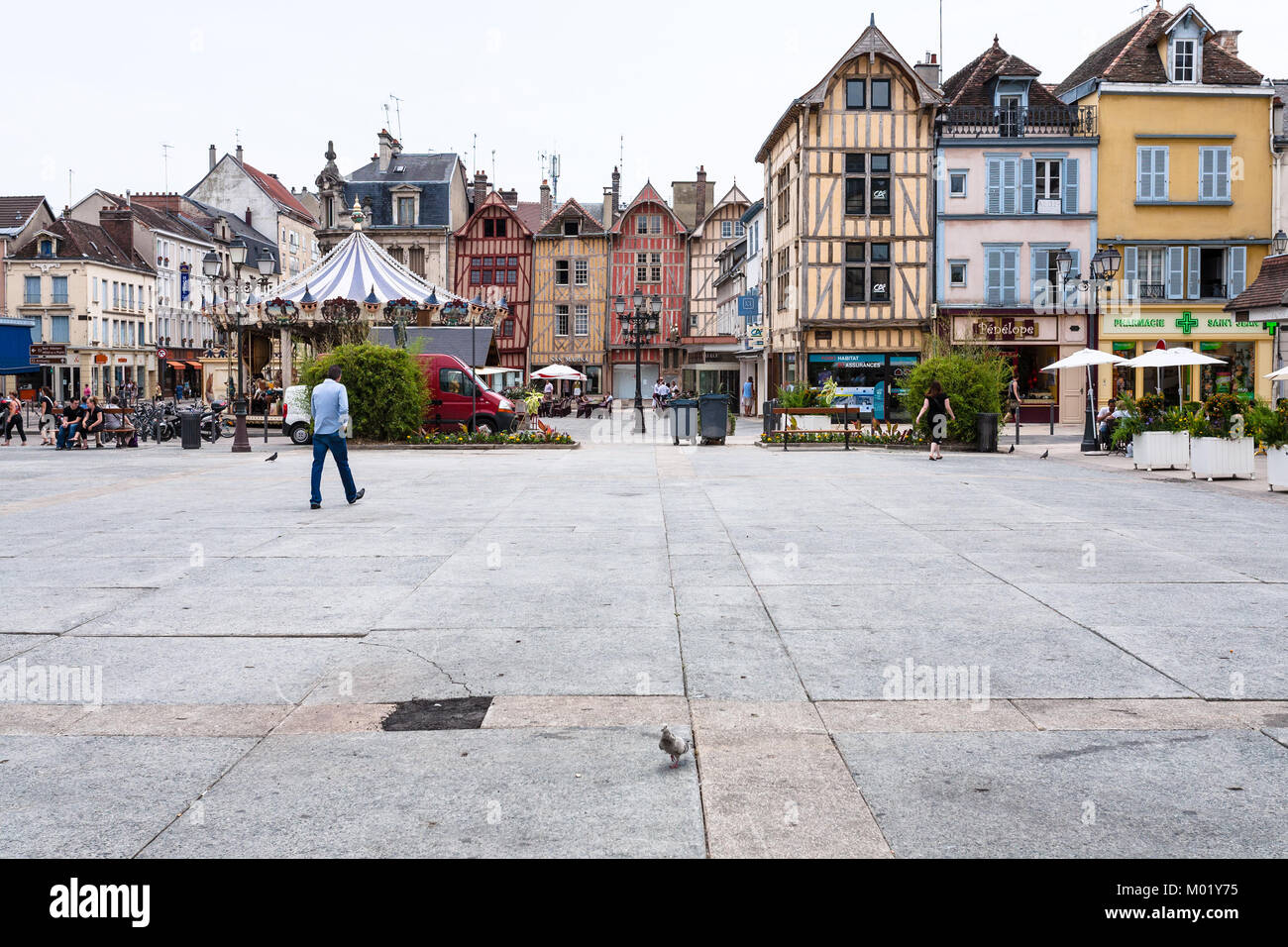 TROYES, FRANCE - JUNE 29, 2010: people, half-timbered houses, carousel ...