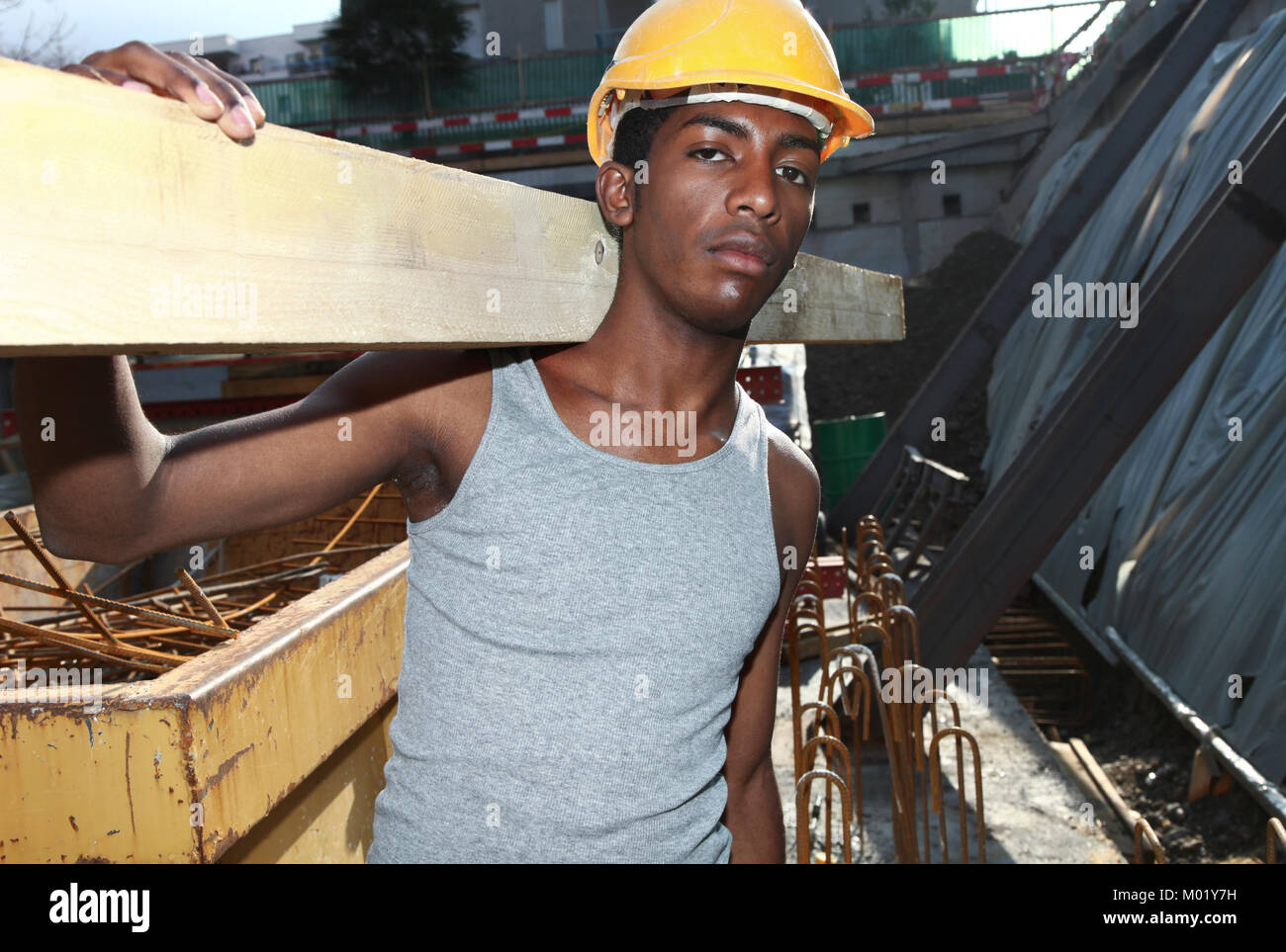 young black man working in construction site Stock Photo - Alamy