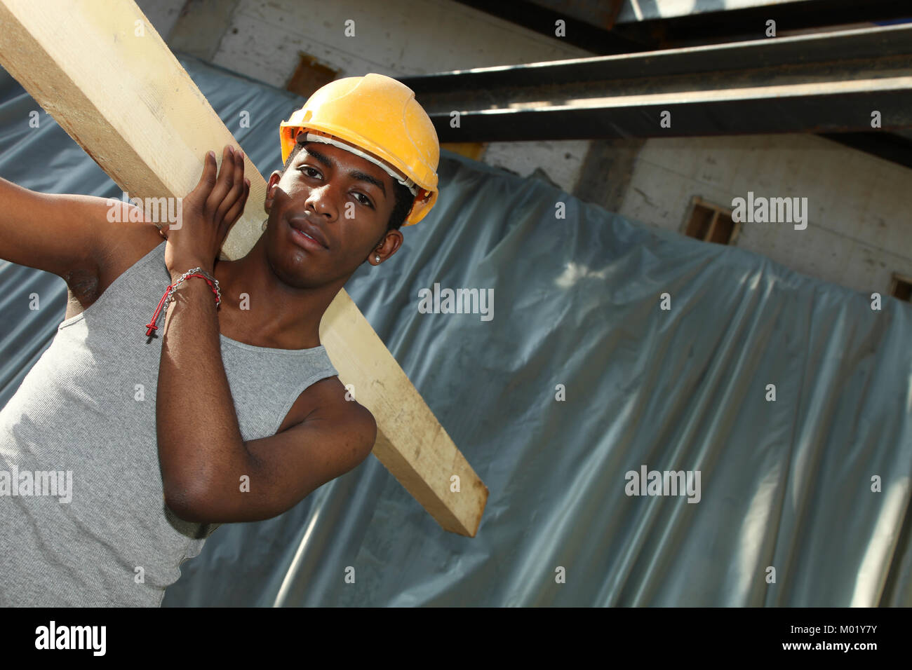 young black man working in construction site Stock Photo - Alamy