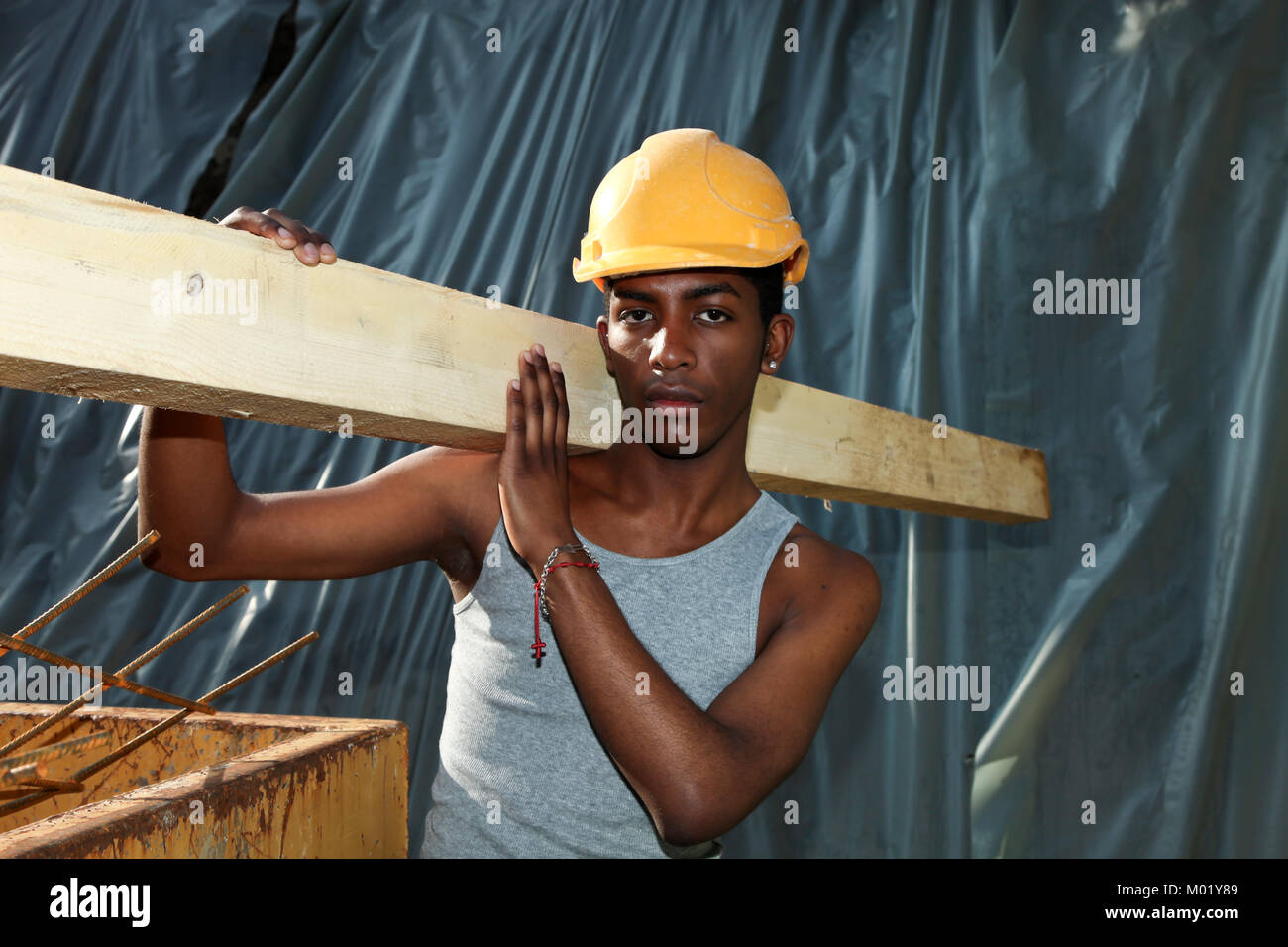 young black man working in construction site Stock Photo - Alamy