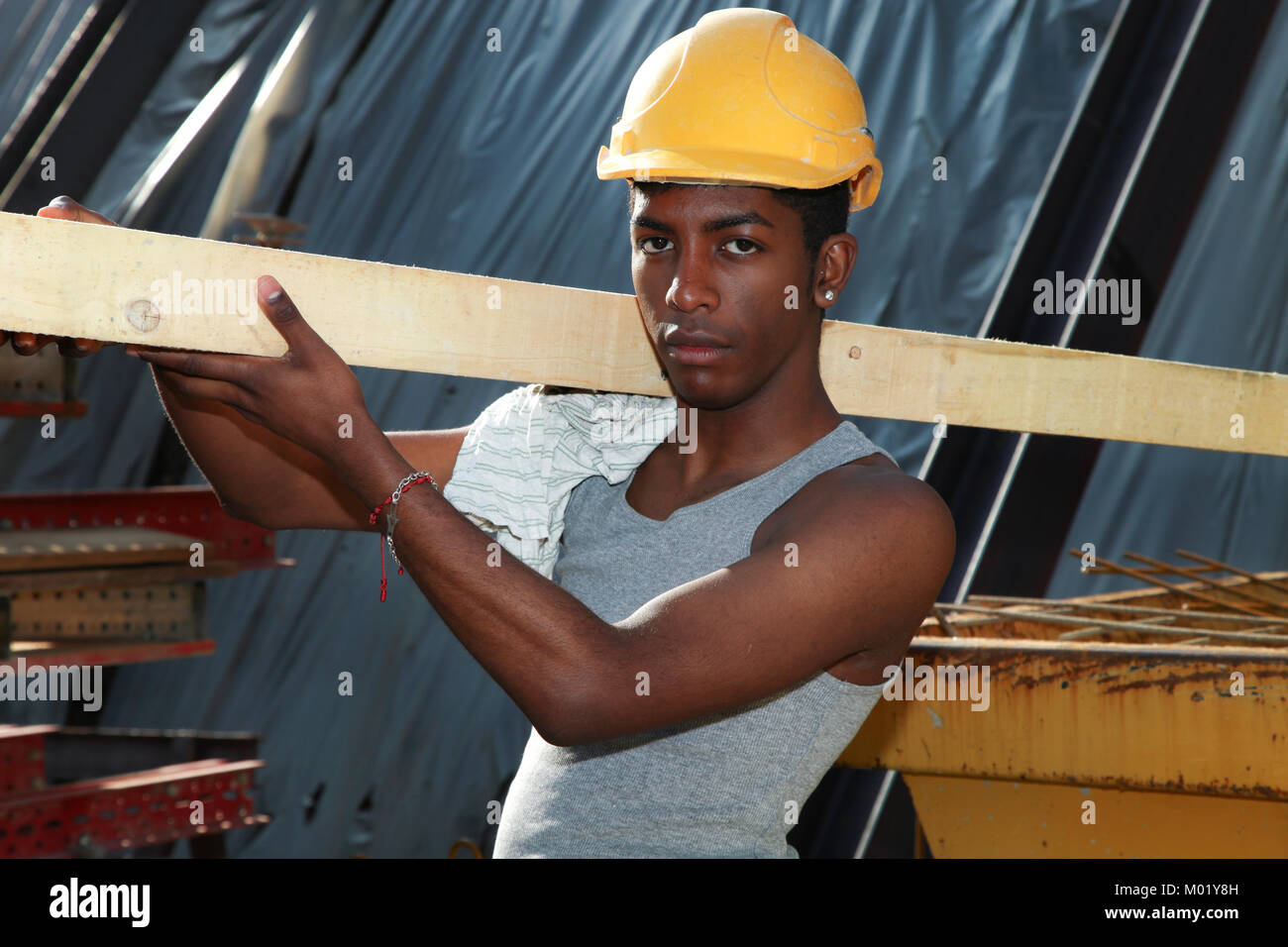 young black man working in construction site Stock Photo - Alamy