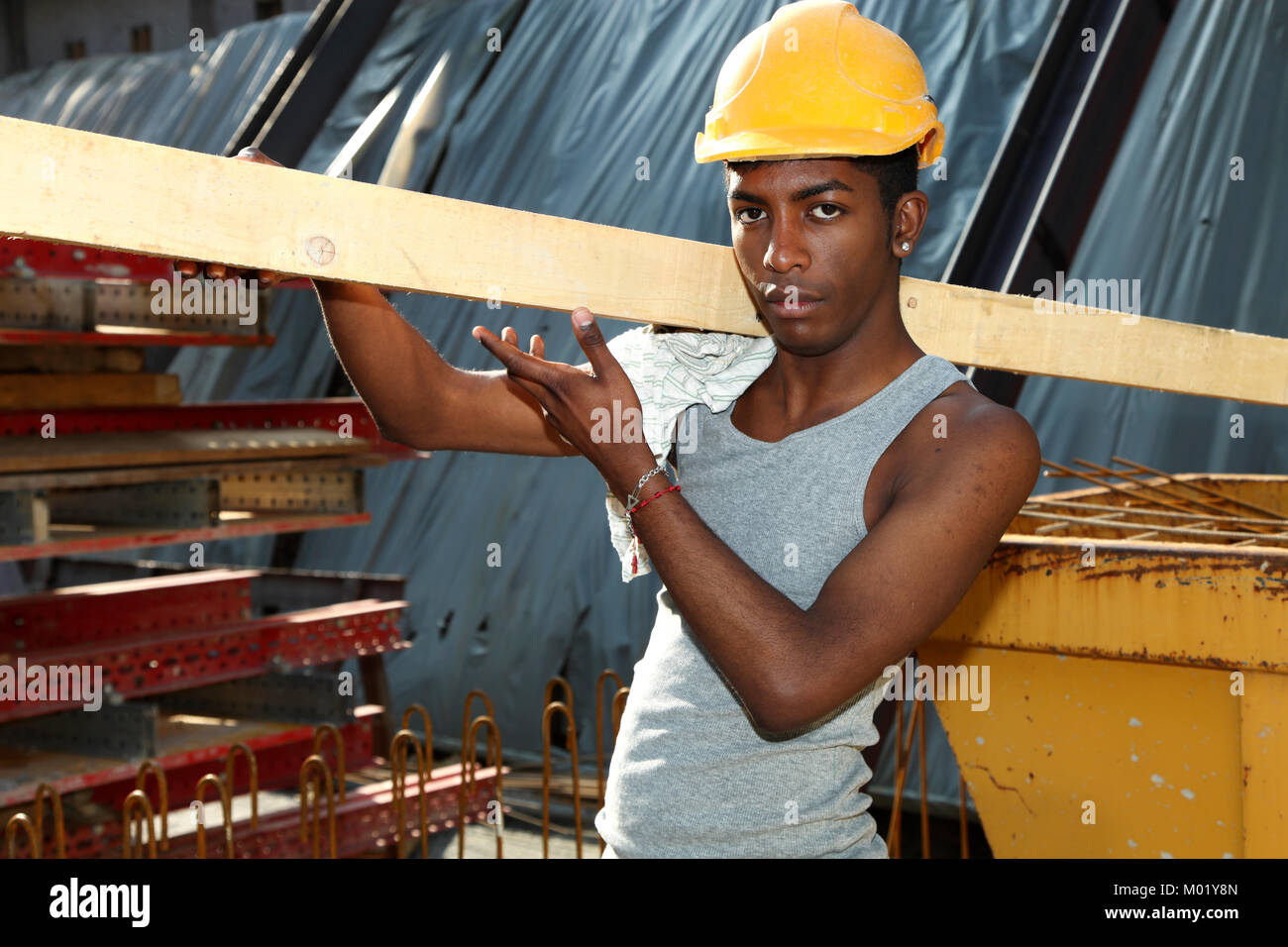 young black man working in construction site Stock Photo - Alamy