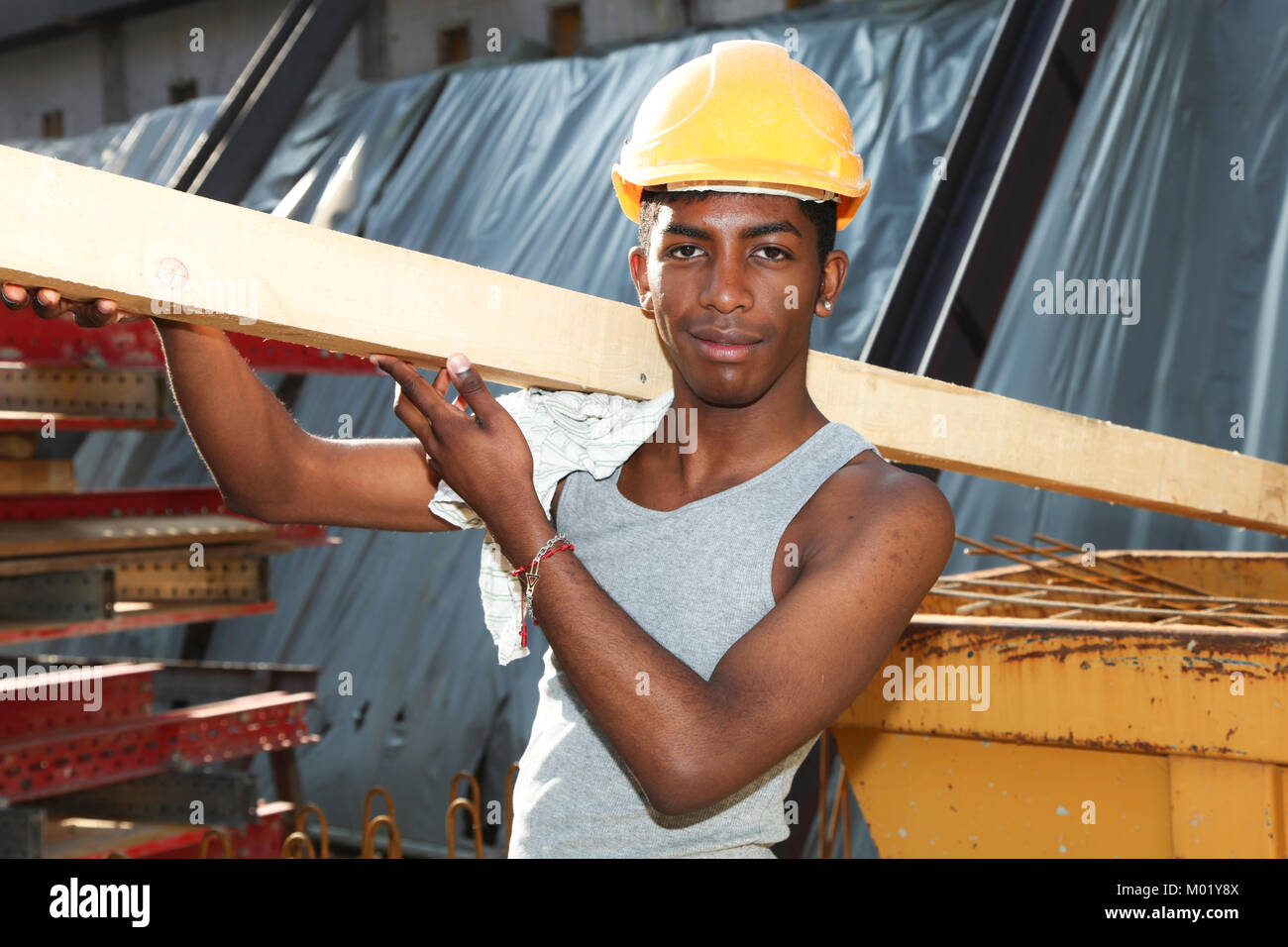 young black man working in construction site Stock Photo - Alamy