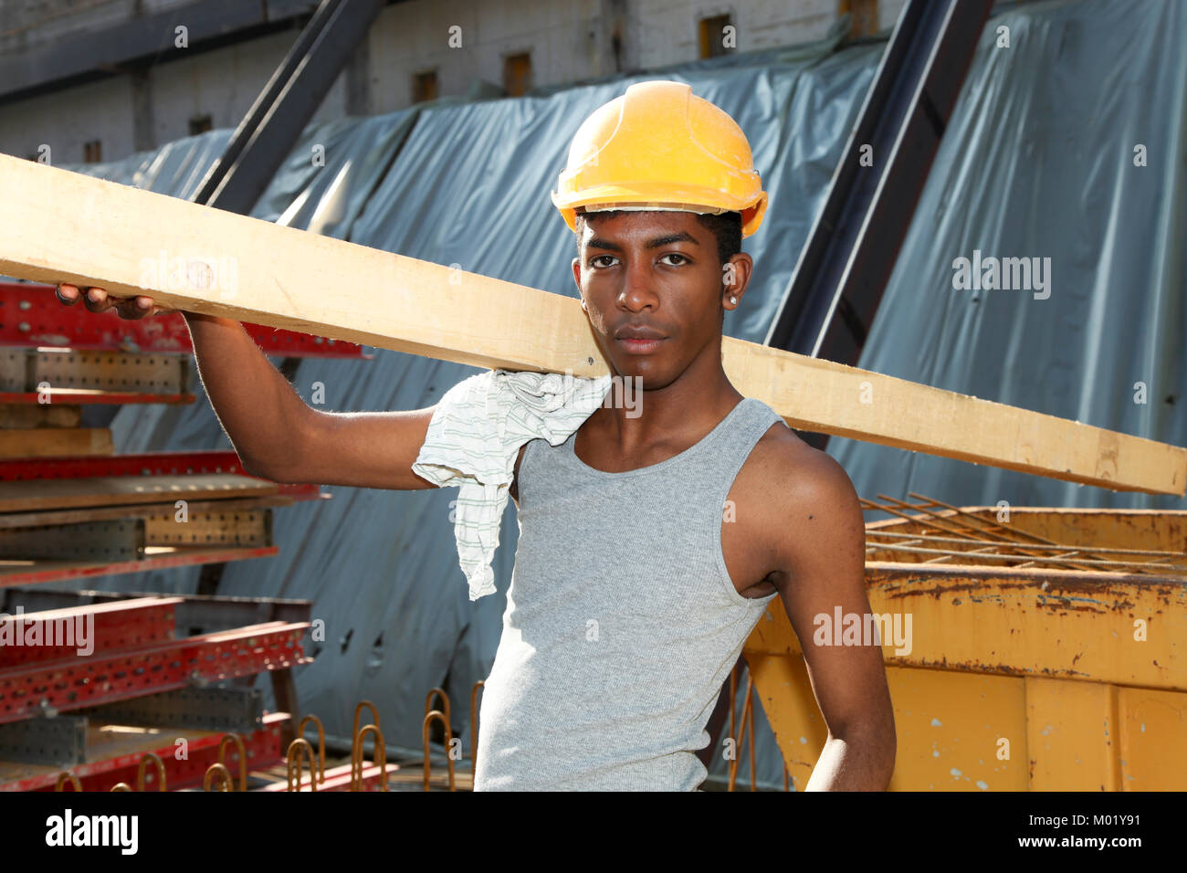 young black man working in construction site Stock Photo - Alamy