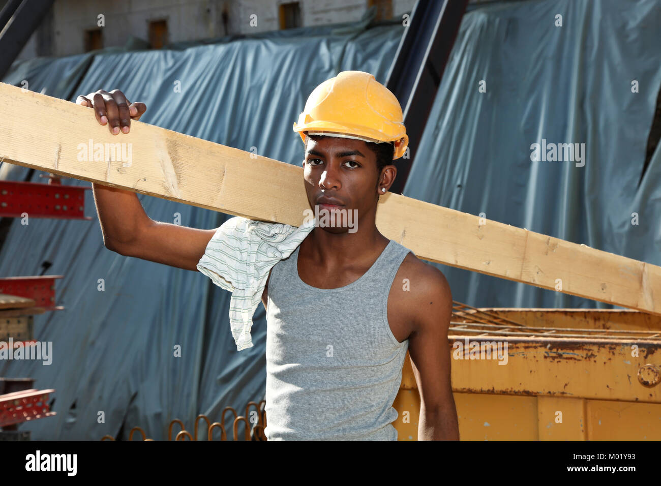 young black man working in construction site Stock Photo - Alamy