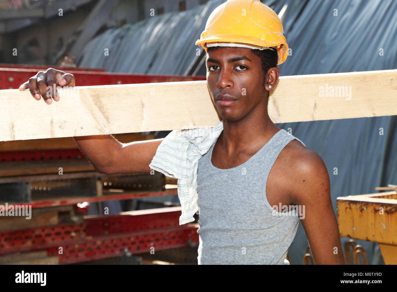 young black man working in construction site Stock Photo - Alamy