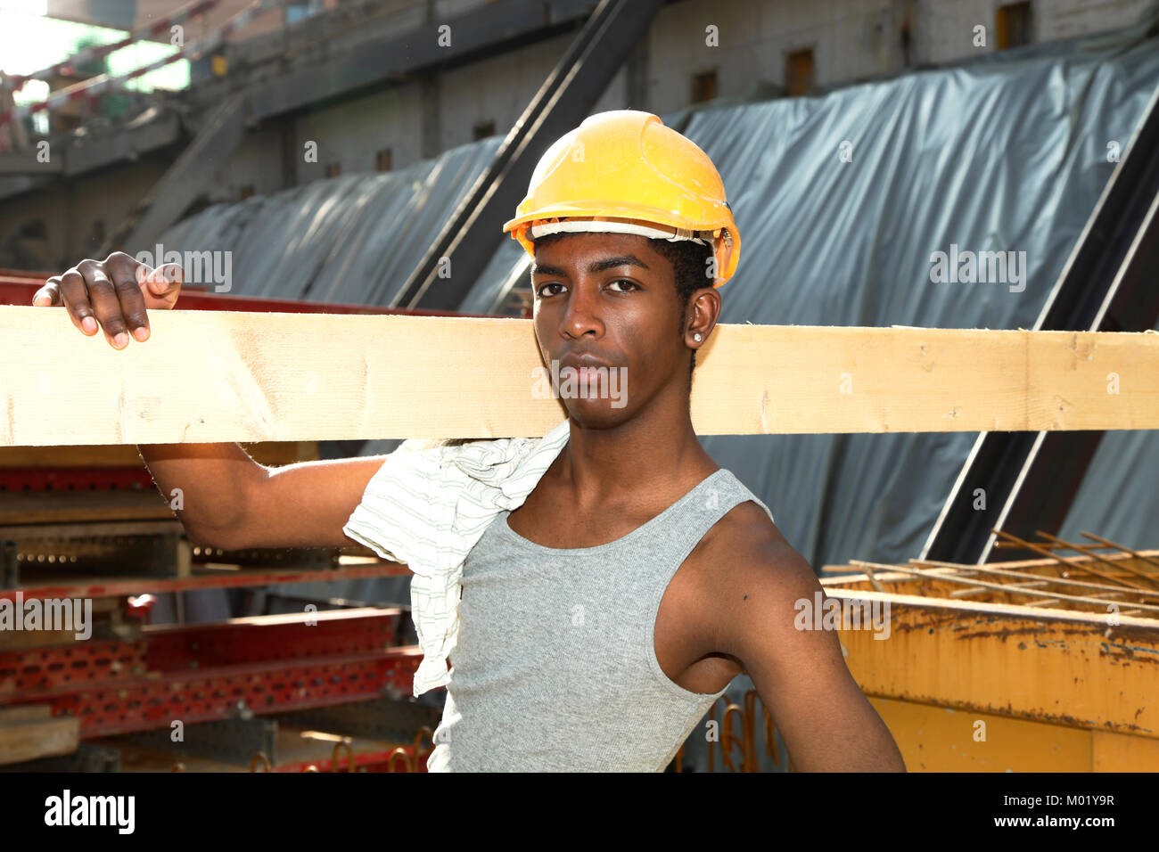 young black man working in construction site Stock Photo - Alamy
