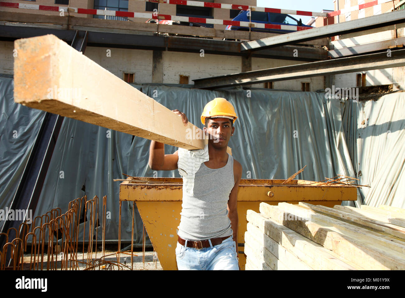 young black man working in construction site Stock Photo - Alamy